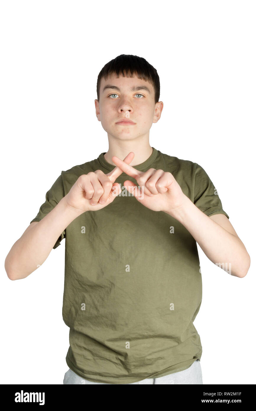 Caucasian teenage boy doing British Sign Language showing the symbol ...