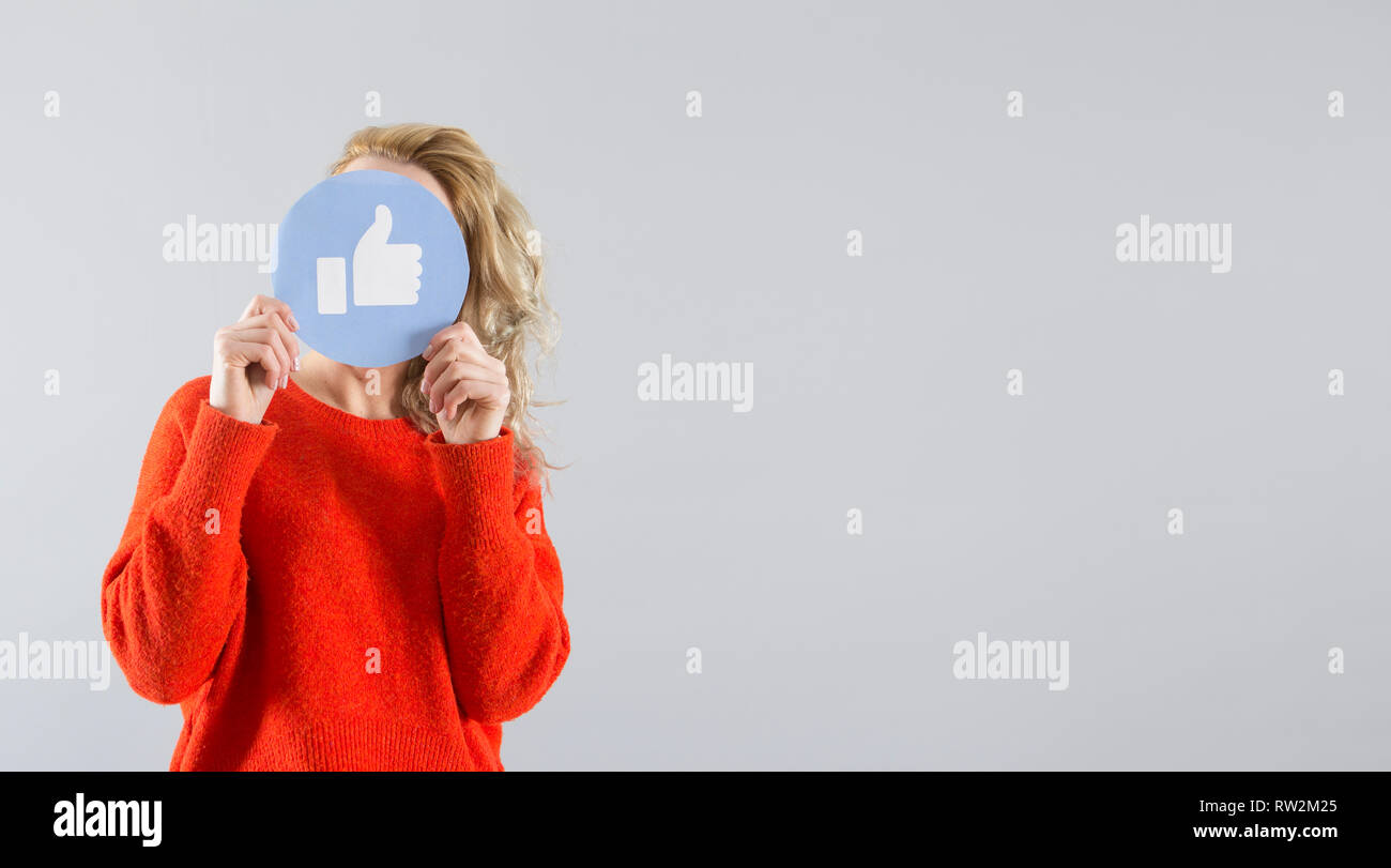 female follower like button lifts up into the air Stock Photo - Alamy