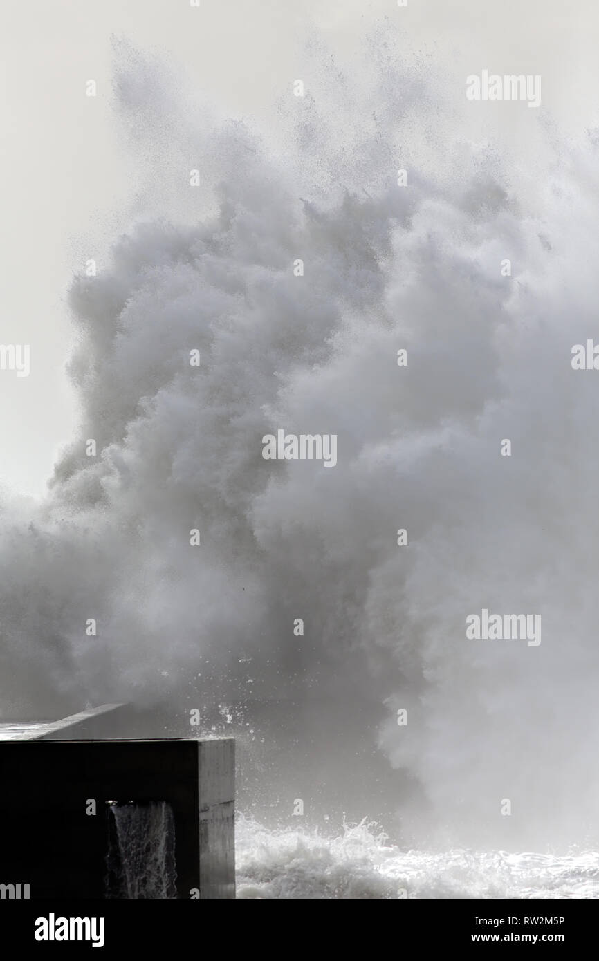 Huge stormy wave splash over a pier Stock Photo - Alamy
