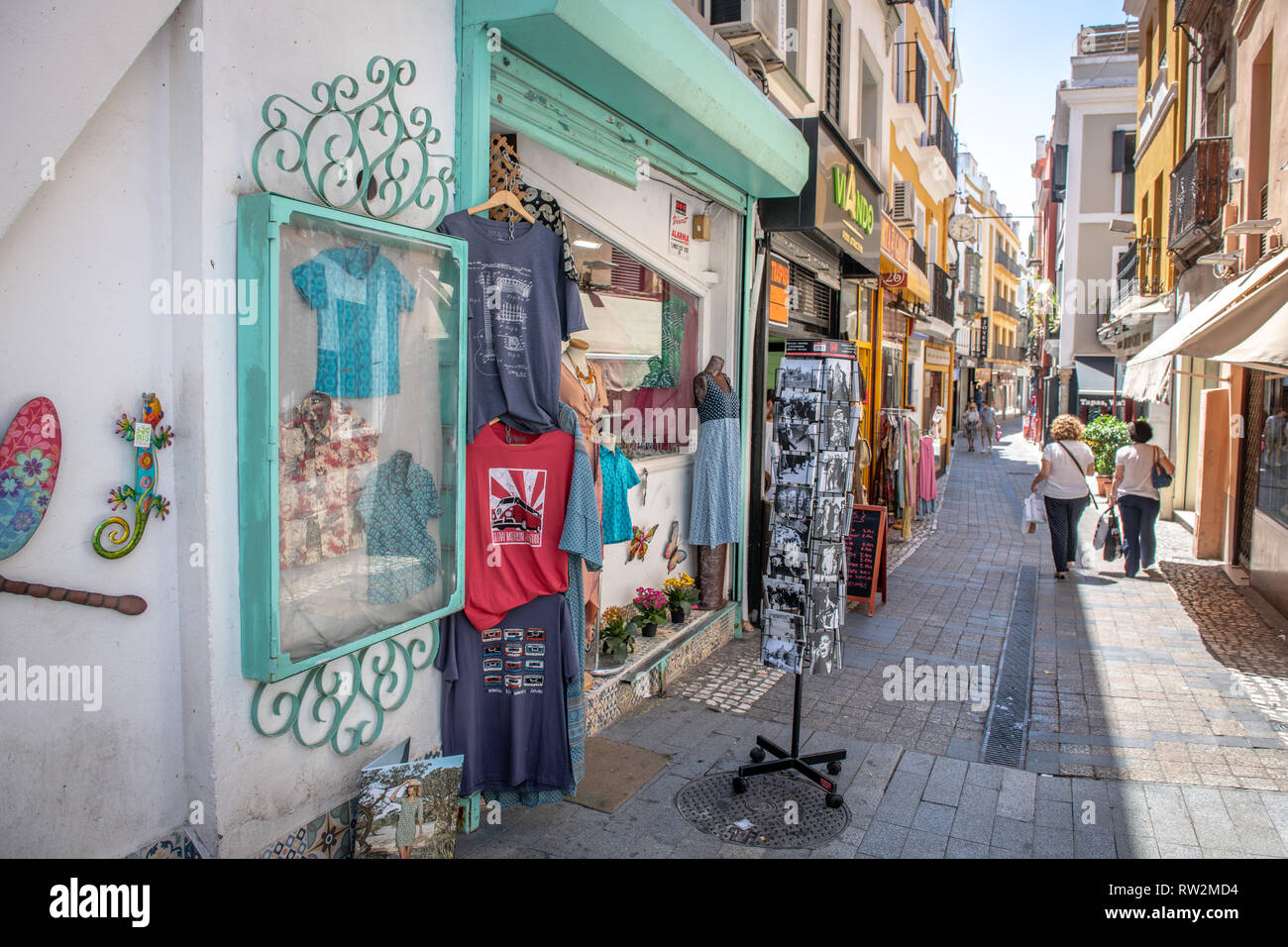 Shops on the street in Seville , Spain Stock Photo - Alamy