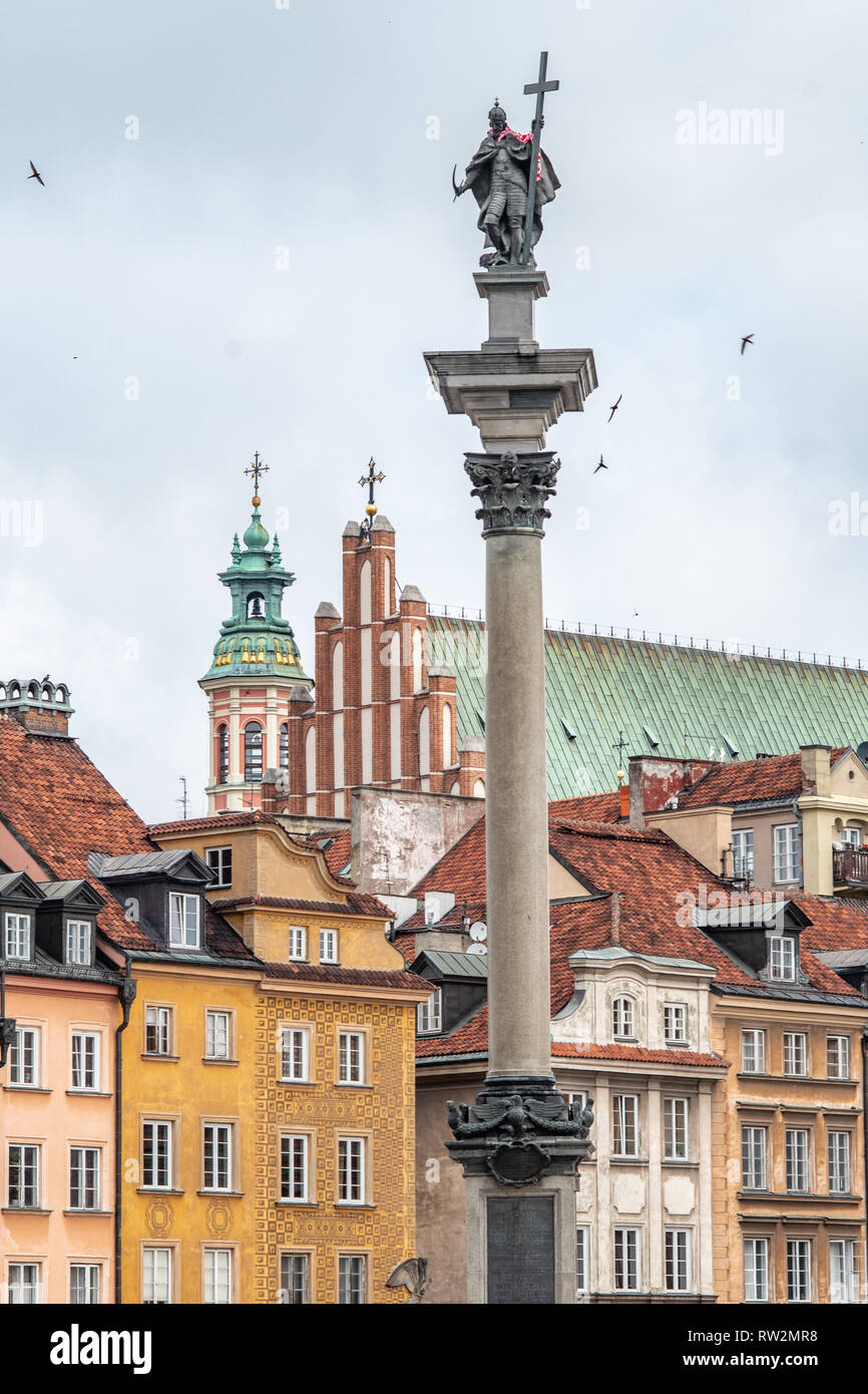 a statue holding a sword and cross in Warsaw, Poland Stock Photo - Alamy