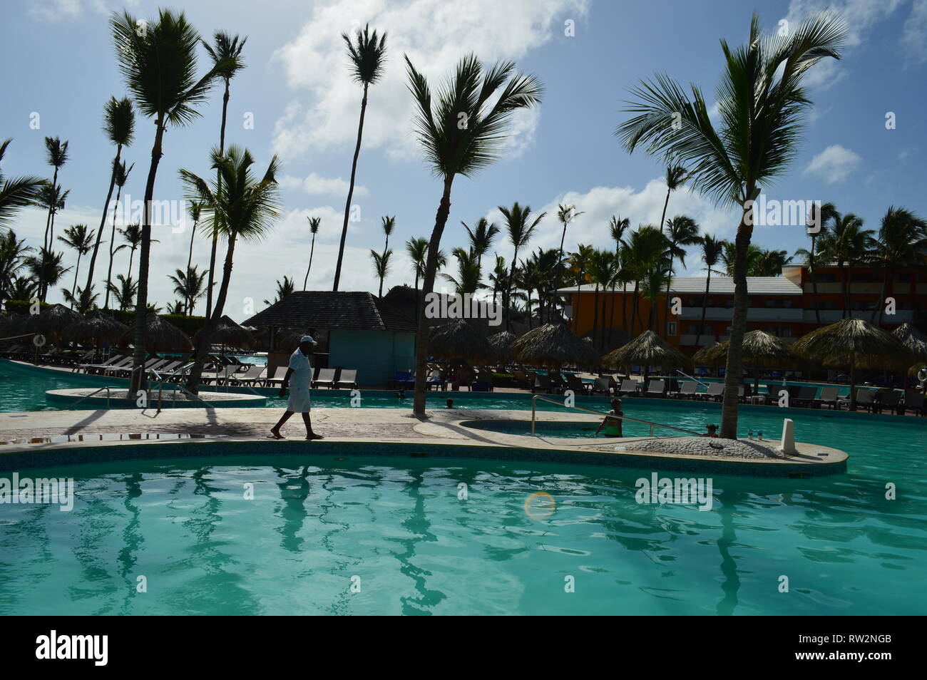 Man walking around pool hi-res stock photography and images - Alamy