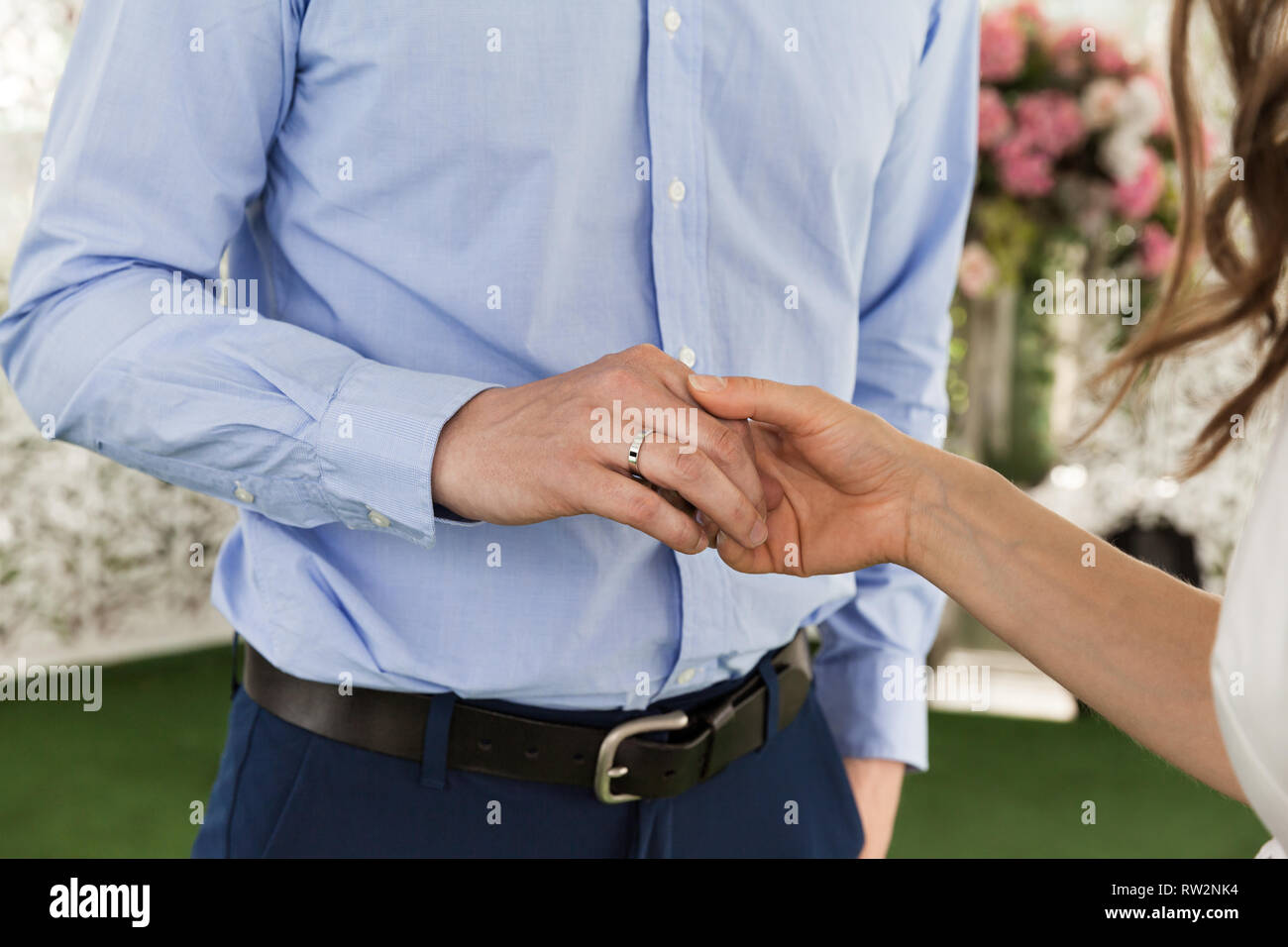 Closeup Of Groom And Bride Holding Hands At Wedding Ceremony, Happy ...