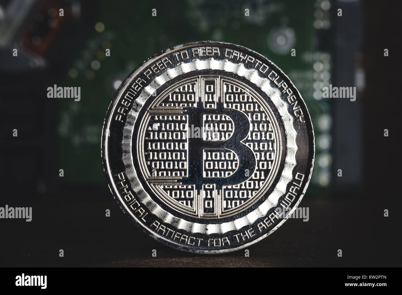 Gold metallic Bitcoins at electronic circuit motherboard.crypto currency mining.Digital money on ...