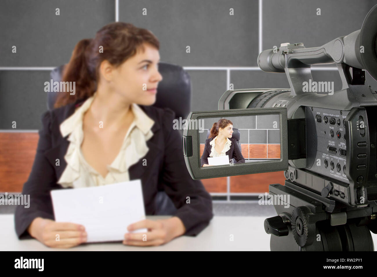 camera view of a female reporter in a news room Stock Photo - Alamy