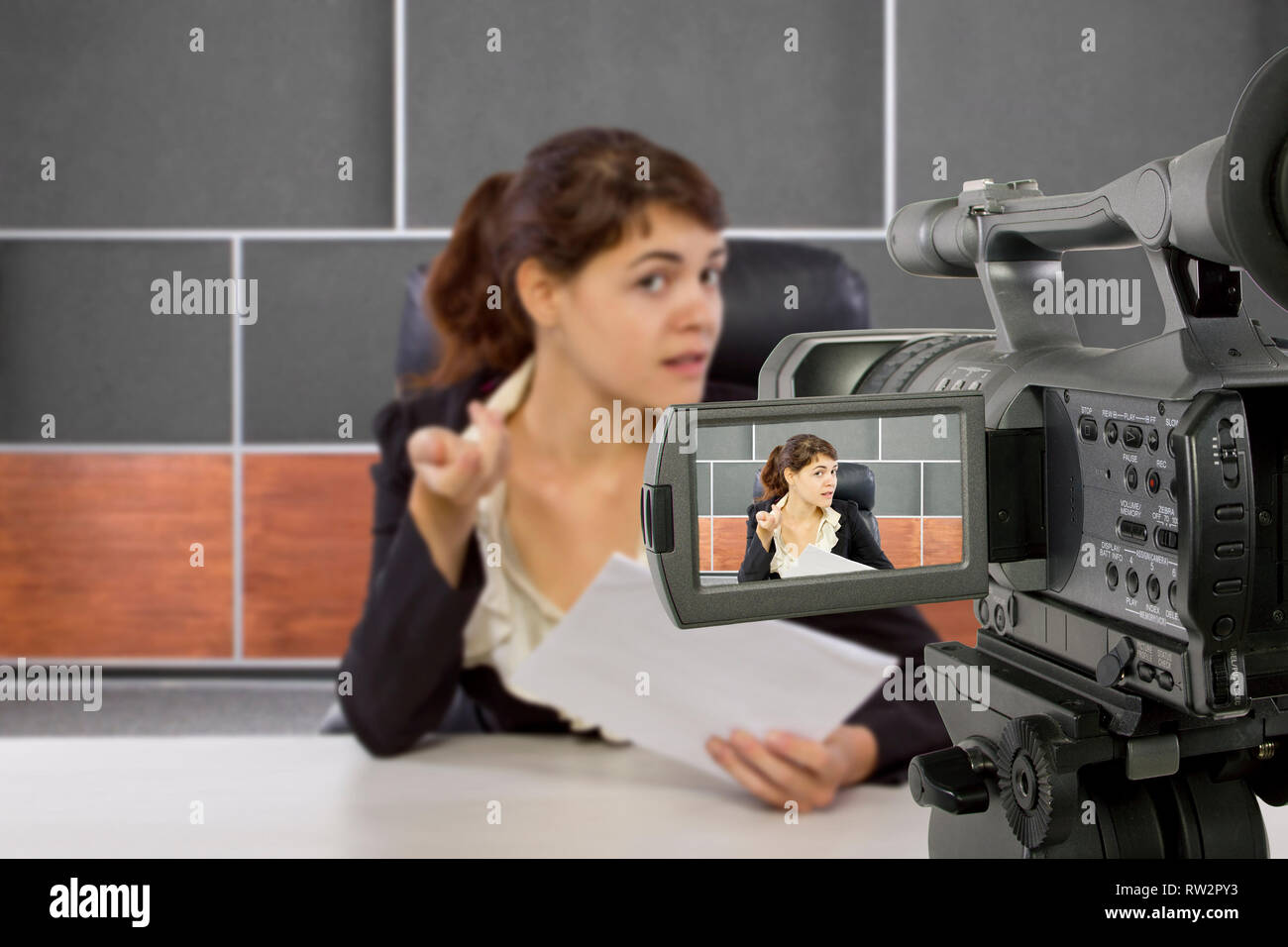 camera view of a female reporter in a news room Stock Photo - Alamy