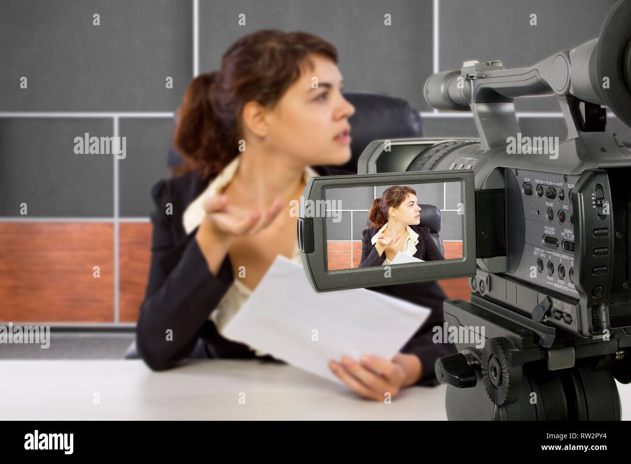 camera view of a female reporter in a news room Stock Photo - Alamy