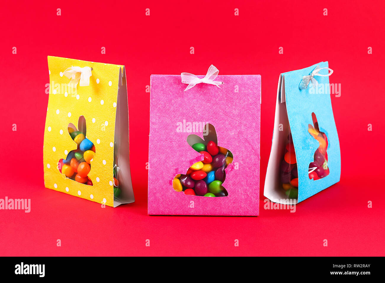 Diy Easter wrapping package sweets in a bag with a cut out bunny ...