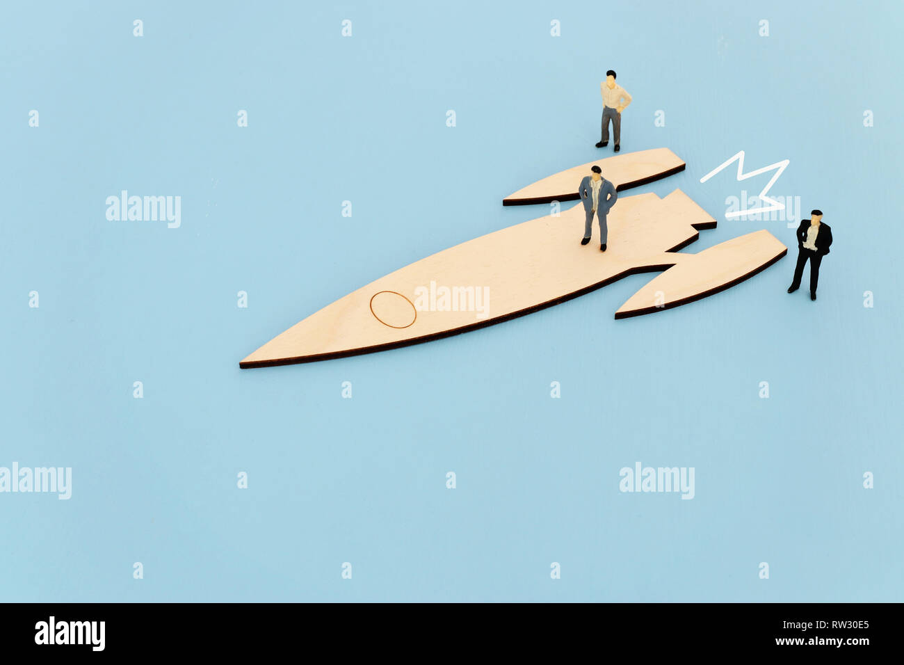 leadership and teamwork concept miniature people and rocket ...