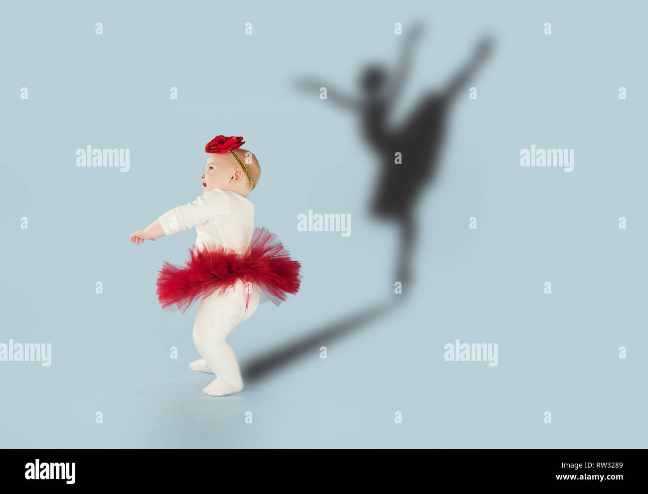 Baby girl dreaming about dancing ballet. Childhood and dream concept ...