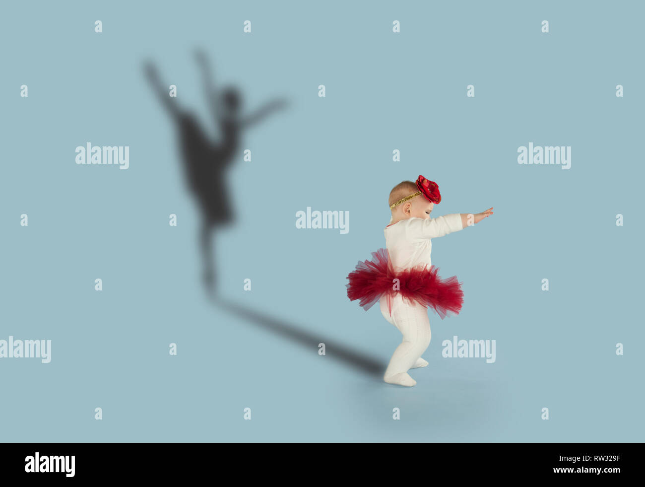 Baby girl dreaming about dancing ballet. Childhood and dream concept ...