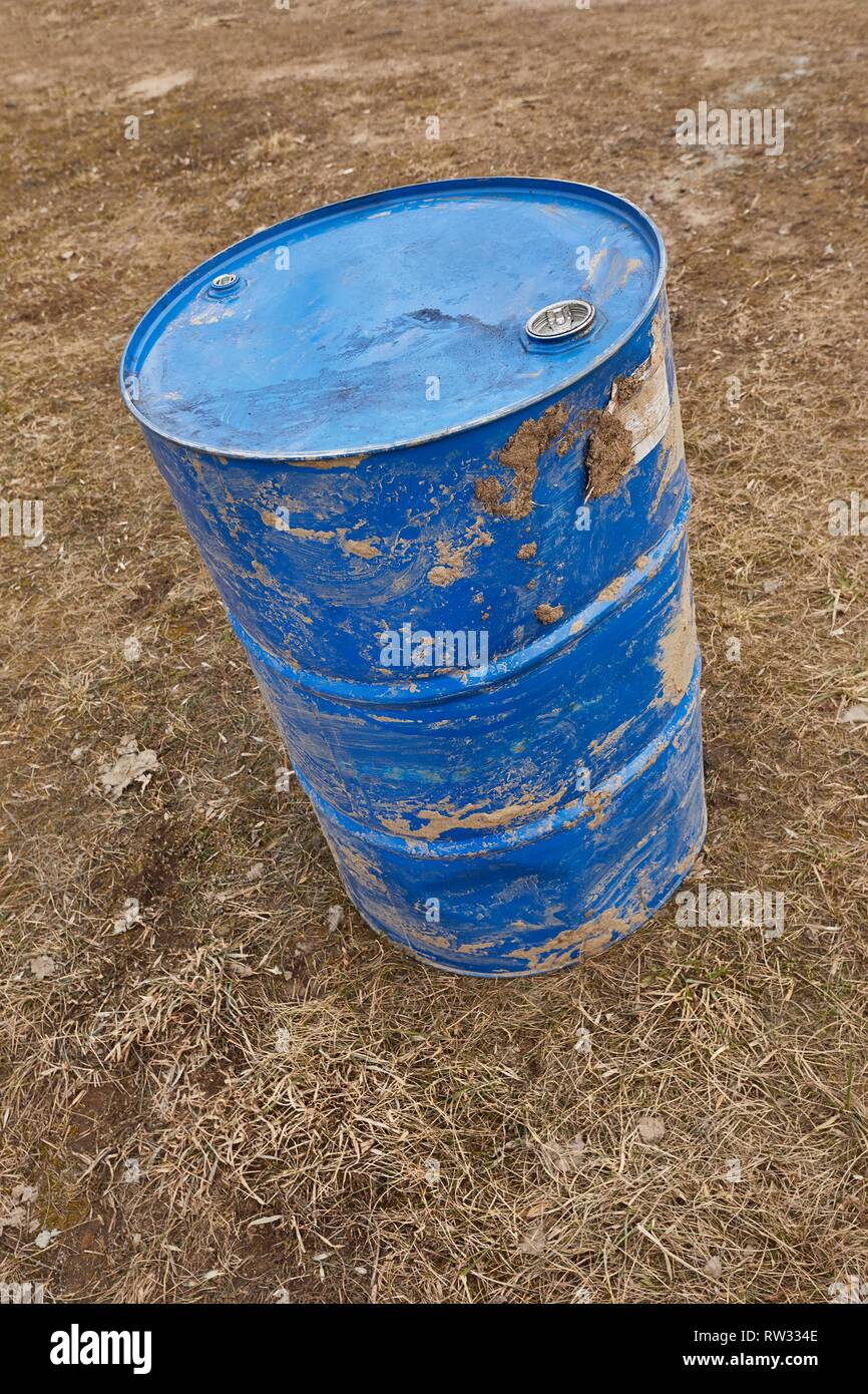Dirty Blue Oil Barrel Stock Photo - Alamy