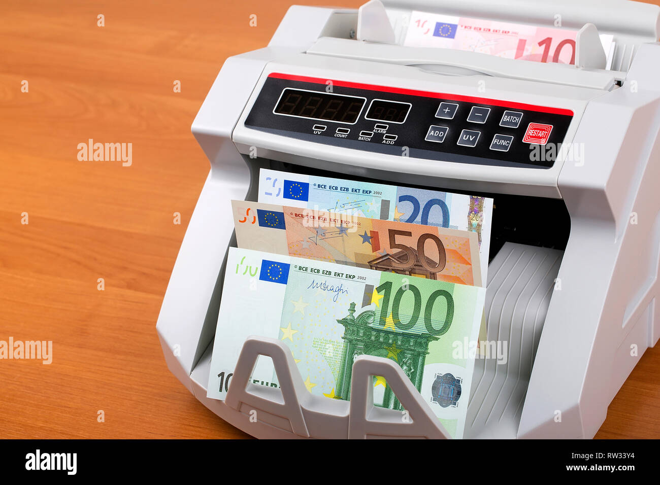 Counting euro banknotes calculator hi-res stock photography and images ...