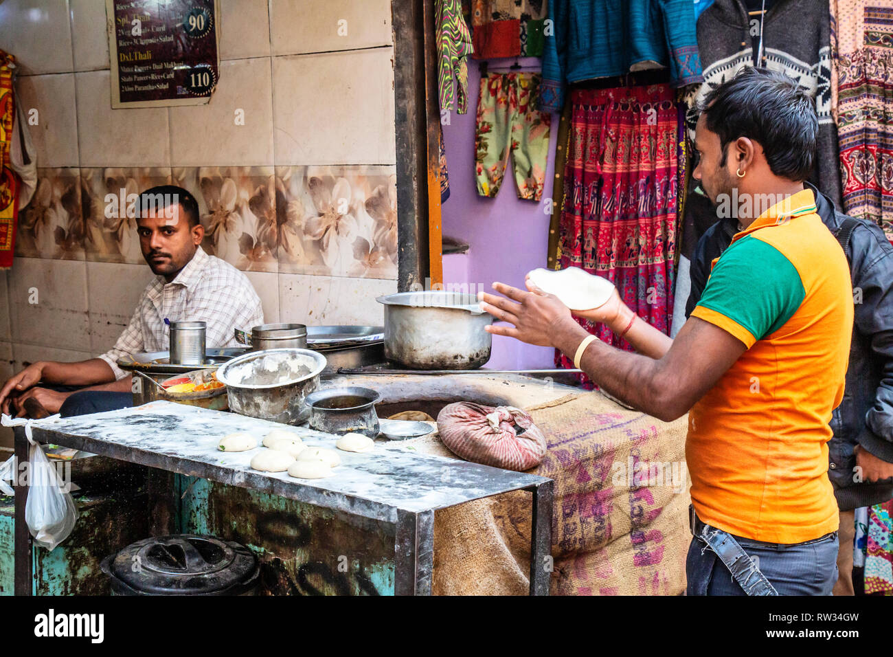 New Delhi, India, January 17, 2019: Indian cooker preparing traditional ...