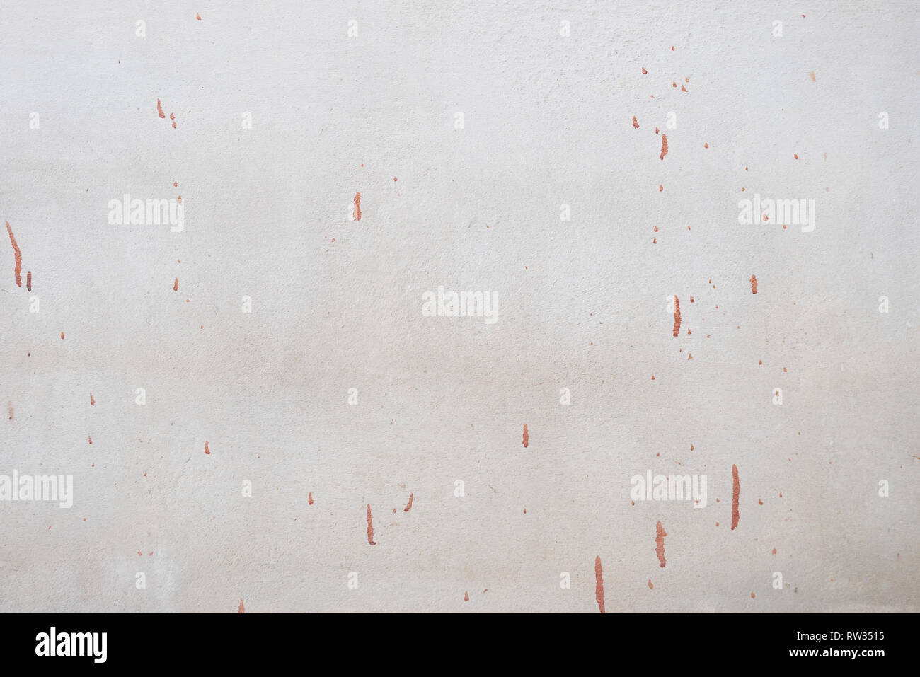 Stains of paint stained on the plaster wall. Blackground and texture of ...