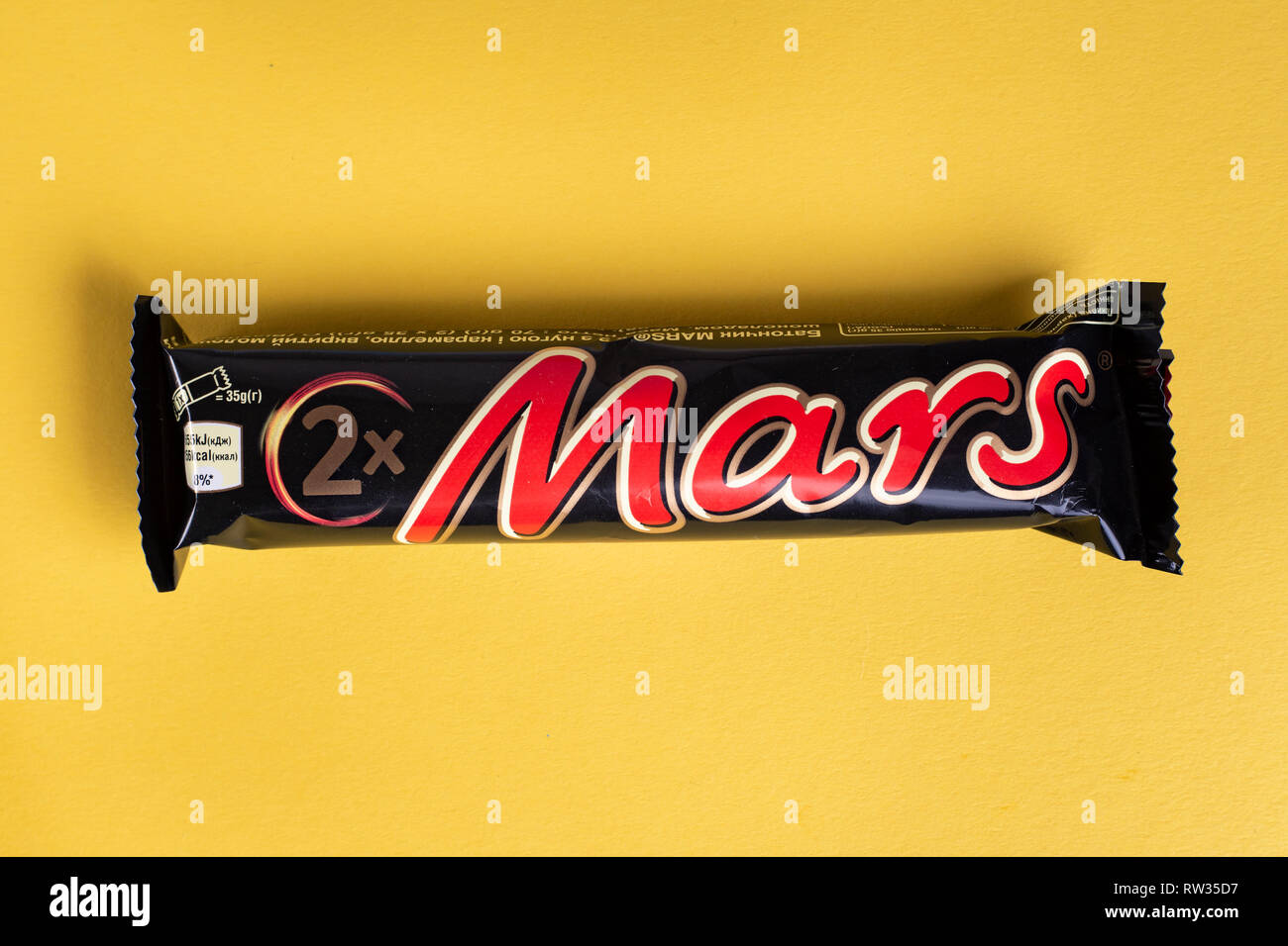Ukraine, Kiev March 29, 2018. Mars chocolate bar on yellow background ...