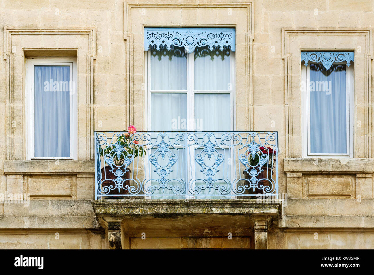 wrought iron balcony on a listed house in the Place aux herbes, Nimes ...