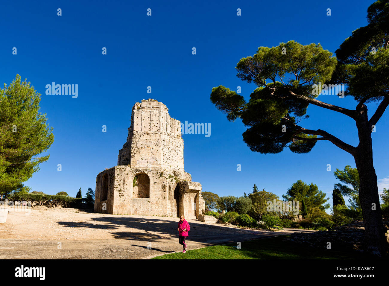 park and ancient ruins of the Tour Magne in Nimes, Provence, France ...