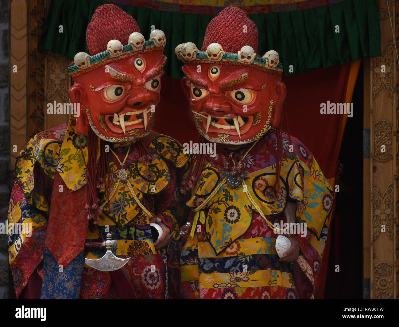 Two Mask Red Mahakala performs Tsam Dance at a festival in the Buddhist ...