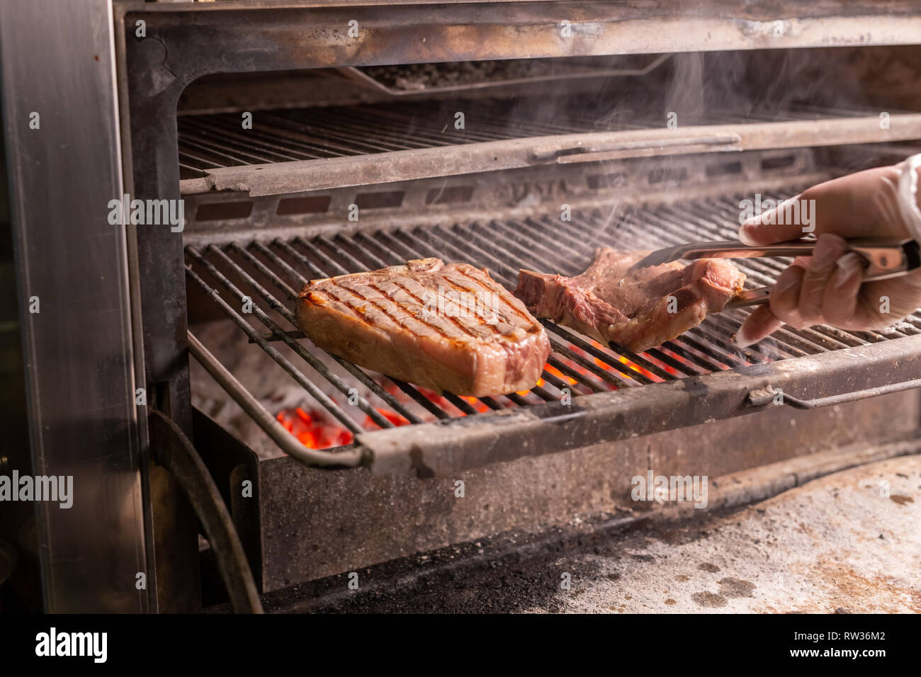 food, craft and delicious concept - cooking stake on a grill Stock ...