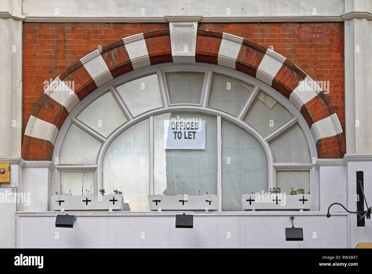 Offices To Let Sign in Building Window Stock Photo - Alamy