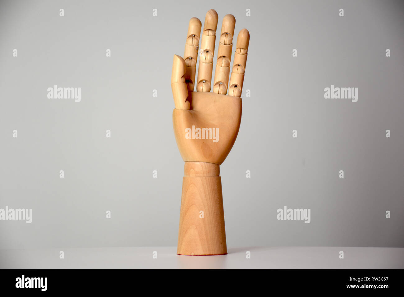Front view of an open hand of wooden Stock Photo - Alamy