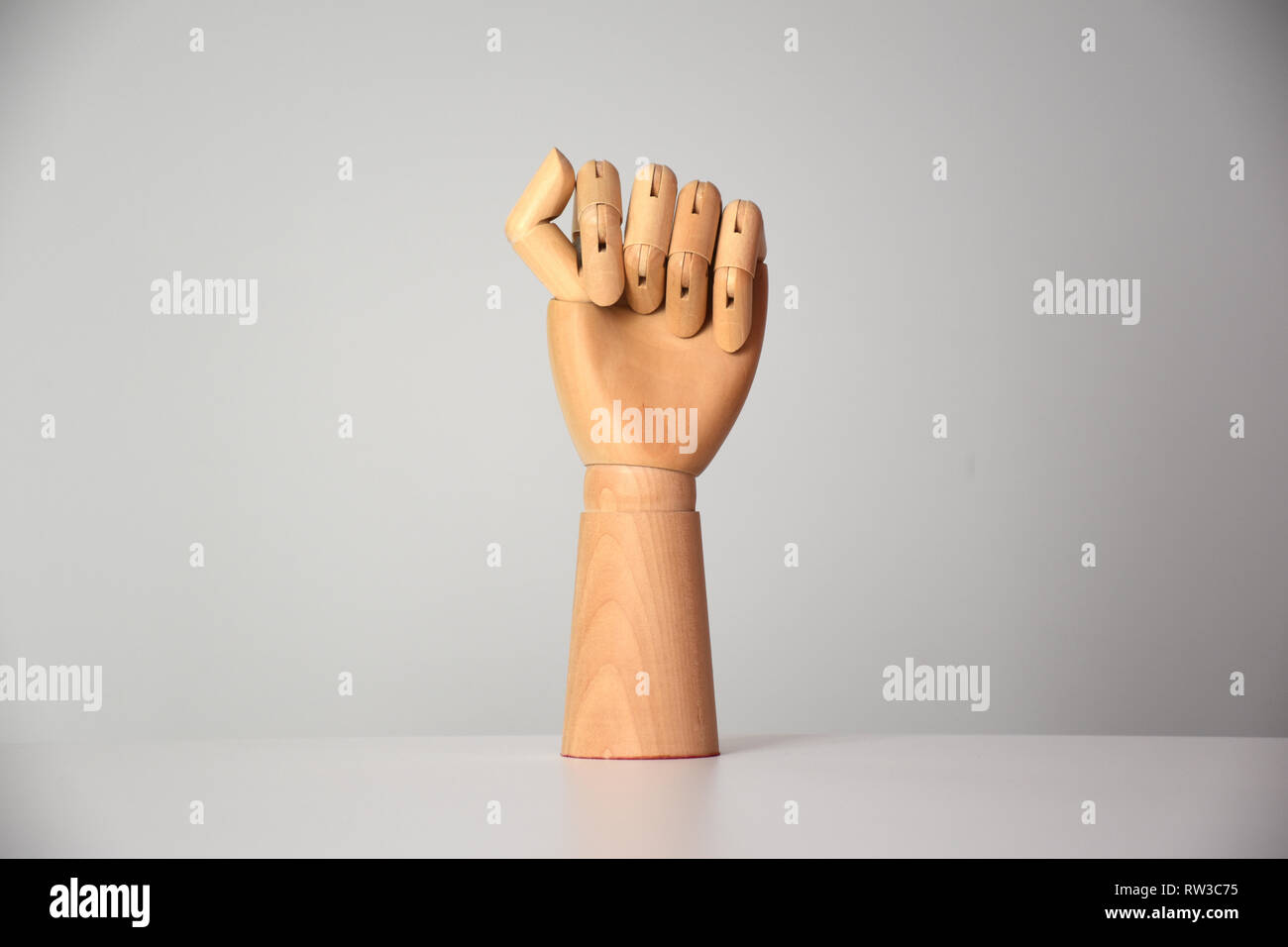 View of wooden hand shaped fist Stock Photo - Alamy