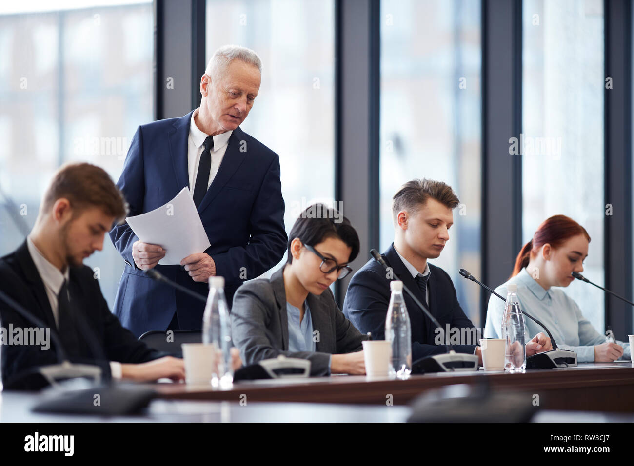 Employees watching the boss hi-res stock photography and images - Alamy