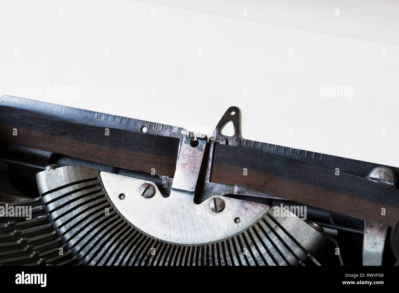 Vintage typewriter close up with the blank sheet of paper Stock Photo ...