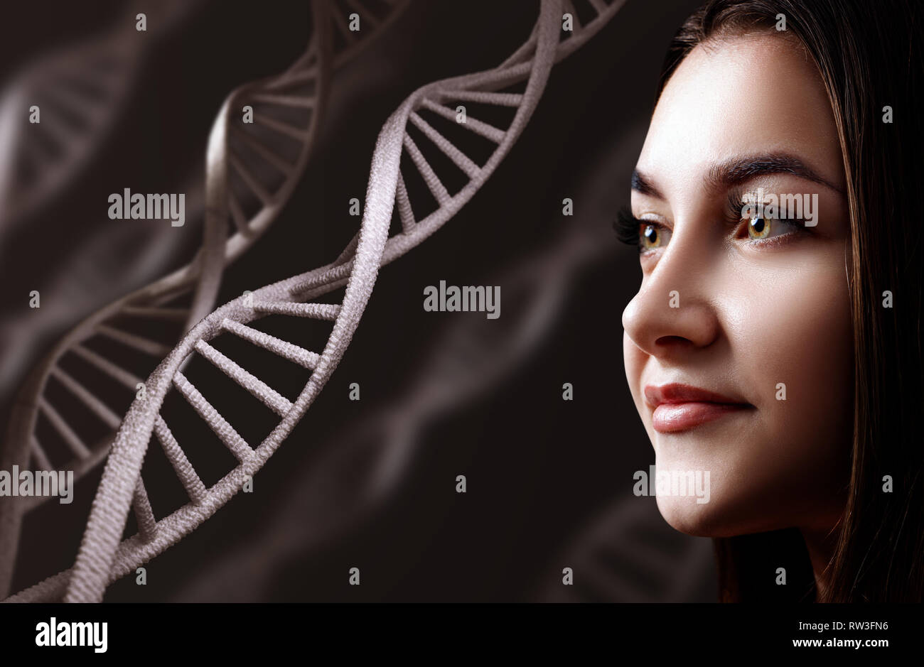 Portrait of sensual young woman among DNA chains. Over black background ...
