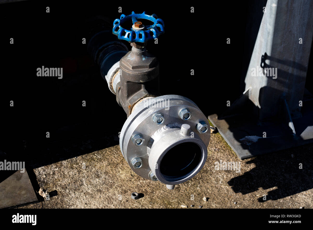 outlet drain off pipe at base of static water tank with stopcock Stock ...
