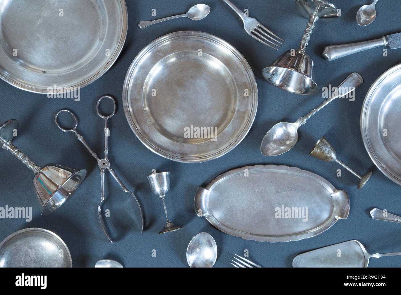 Vintage silverware on gray background Stock Photo - Alamy