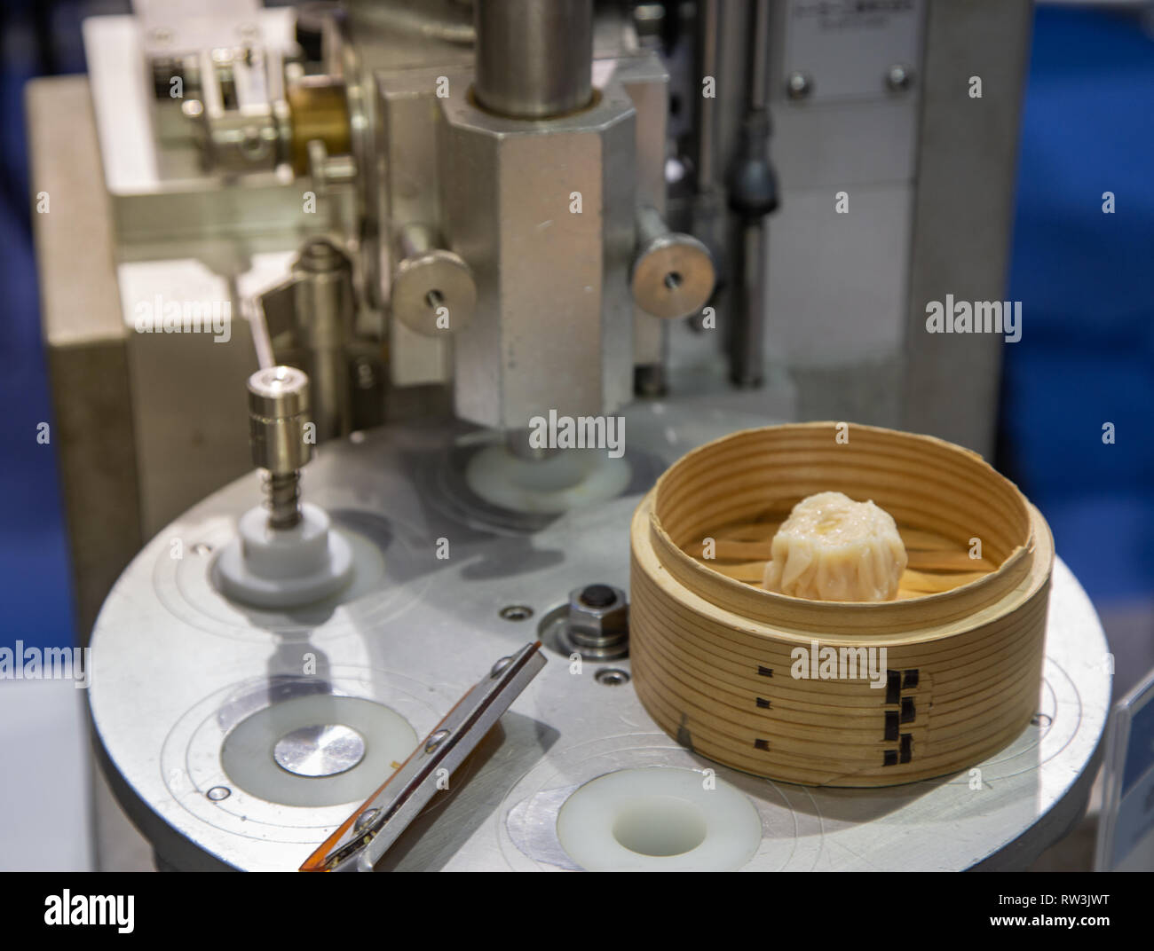 Food processing machine for dumpling and dim sum Stock Photo - Alamy