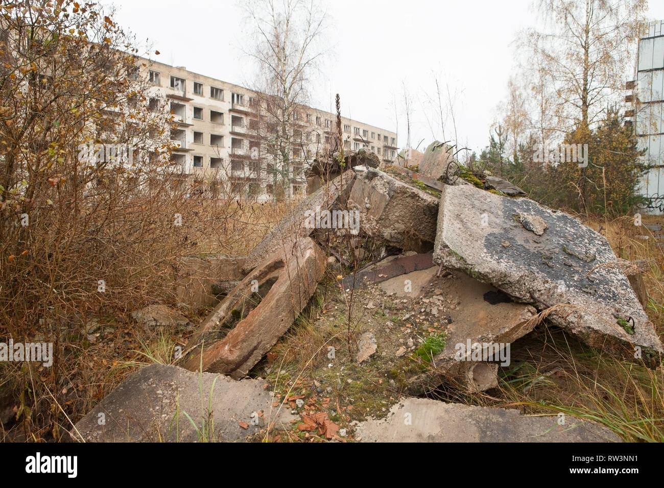 Abandoned apartment blocks and rubble at former Soviet military base ...
