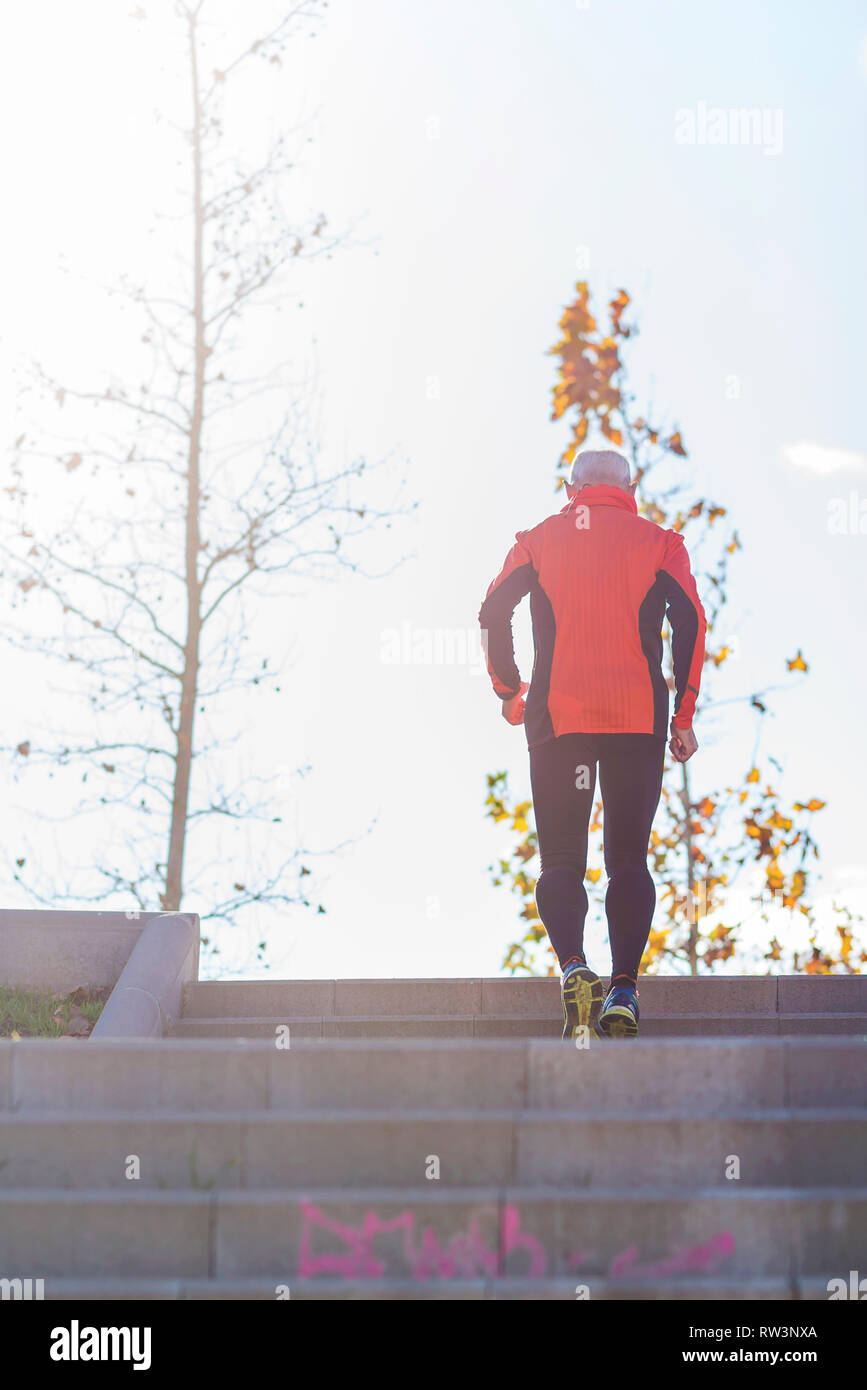 Man running up stairs training hi-res stock photography and images - Alamy