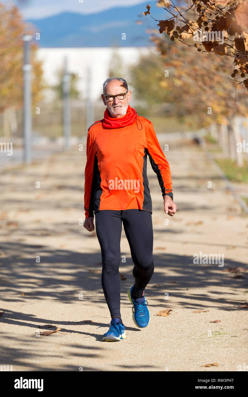 Elderly men jogging hi-res stock photography and images - Alamy