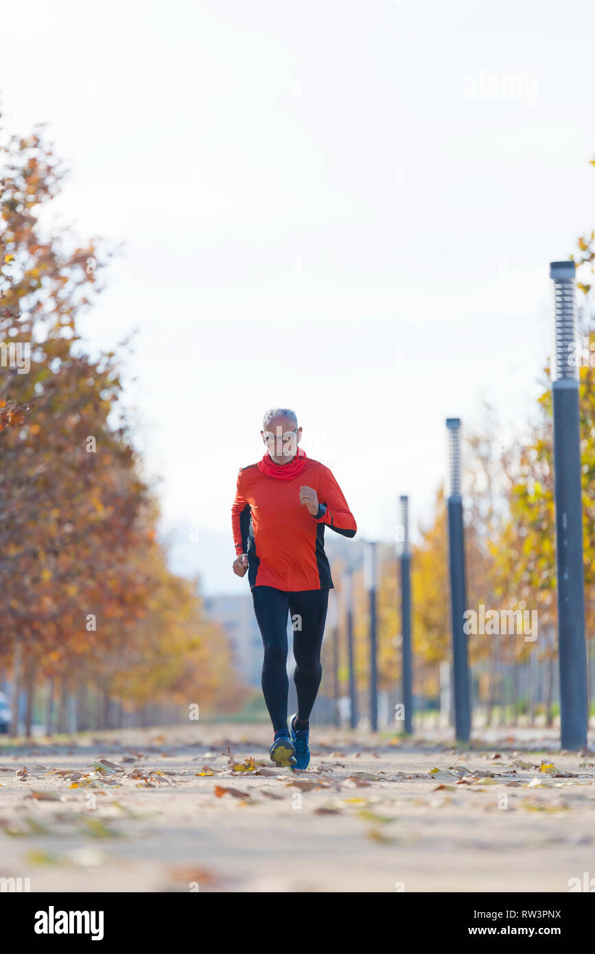 Man jogging in the countryside hi-res stock photography and images - Alamy