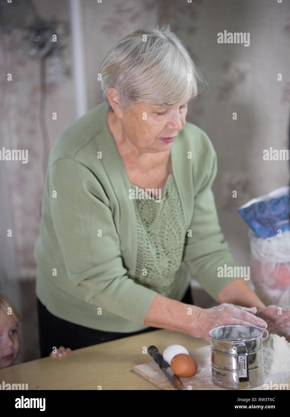 Old lady baking hi-res stock photography and images - Alamy