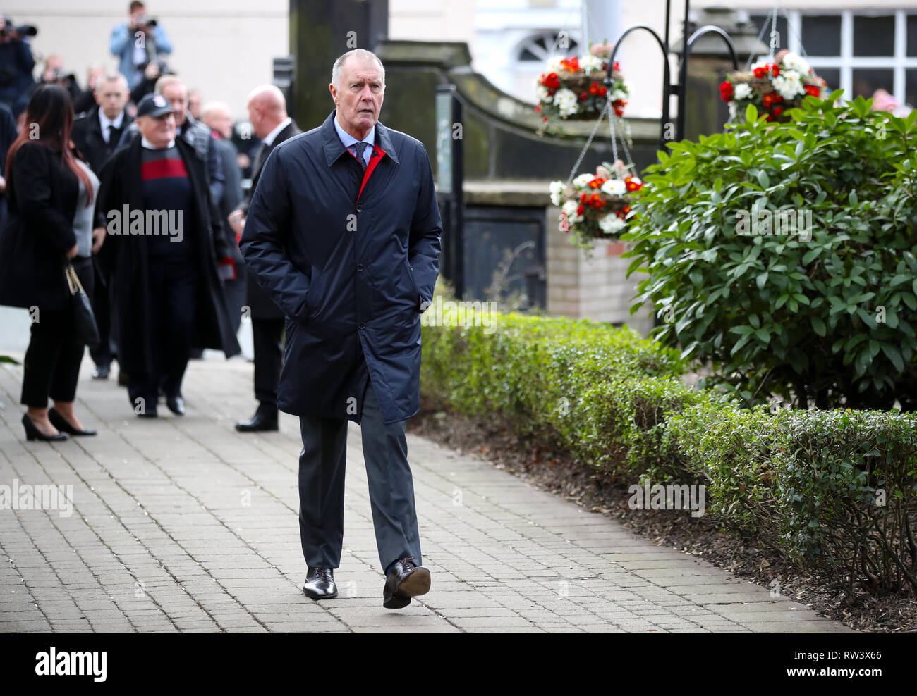 Retired footballer Sir Geoff Hurst arrives at the funeral service for ...