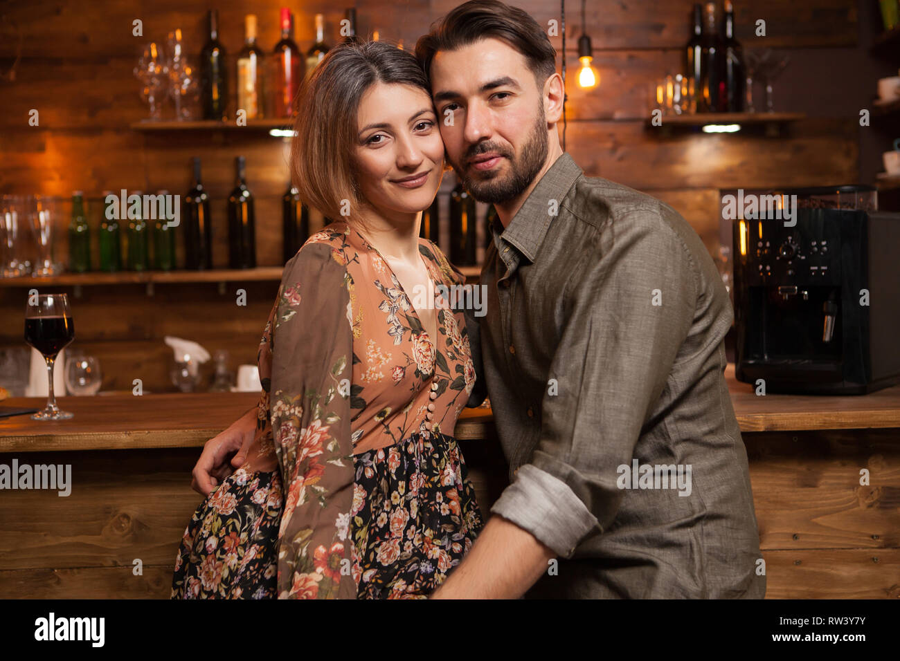 Attractive couple celebrating their aniversary and looking at the ...
