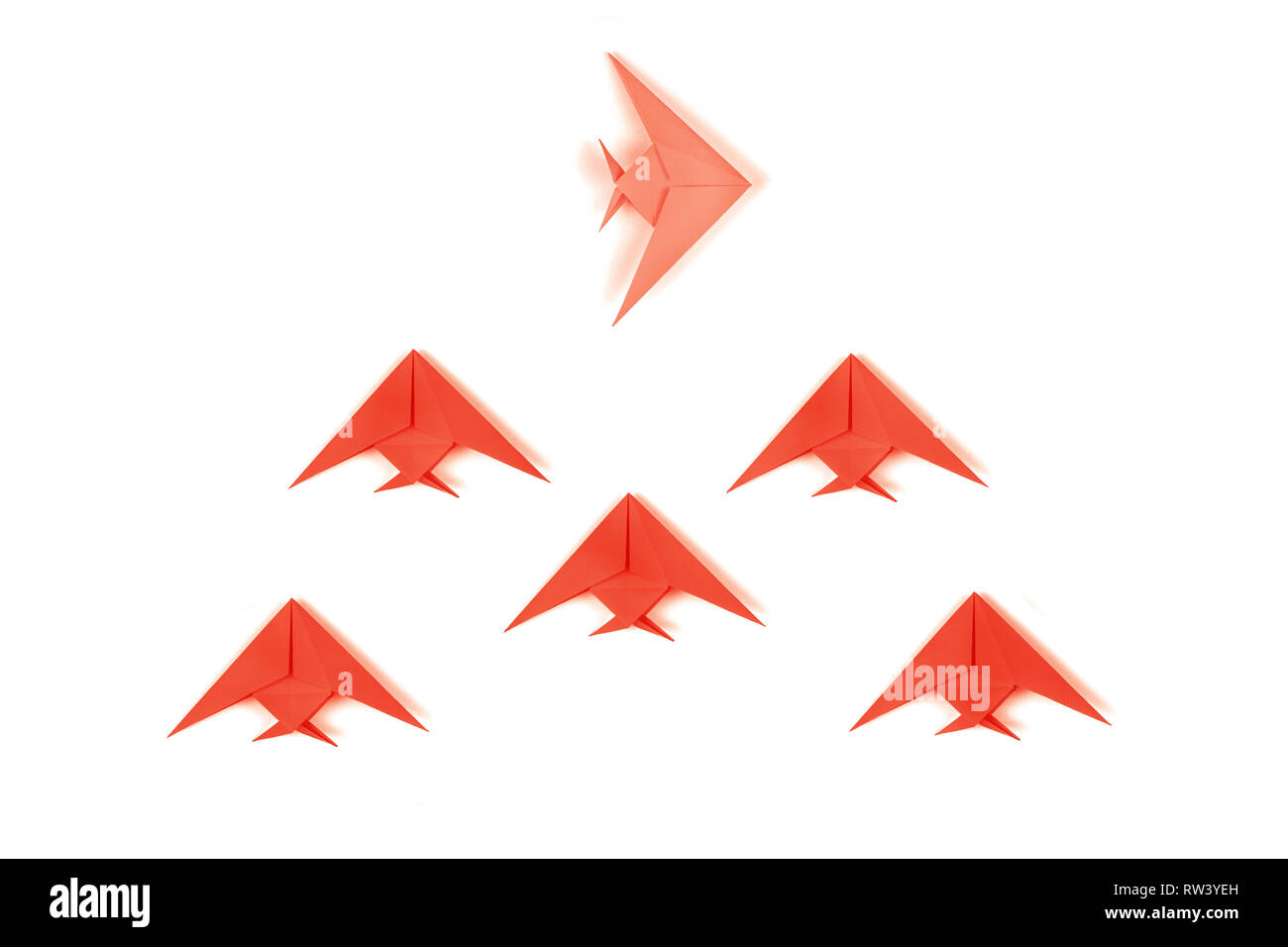 Coral origami fishes isolated on white background Stock Photo - Alamy