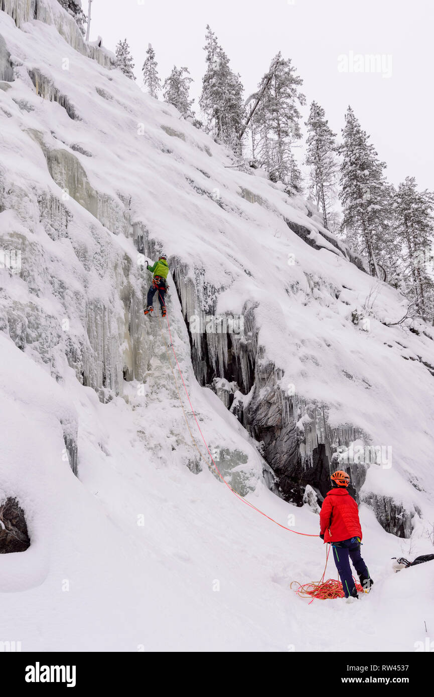 Ice climber on the Mammoth Fall or Mammuttiputous in Kurouoma canyon ...