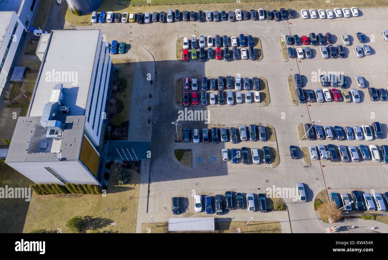 Aerial view of building with parking lot. Commercial Zone Stock Photo ...