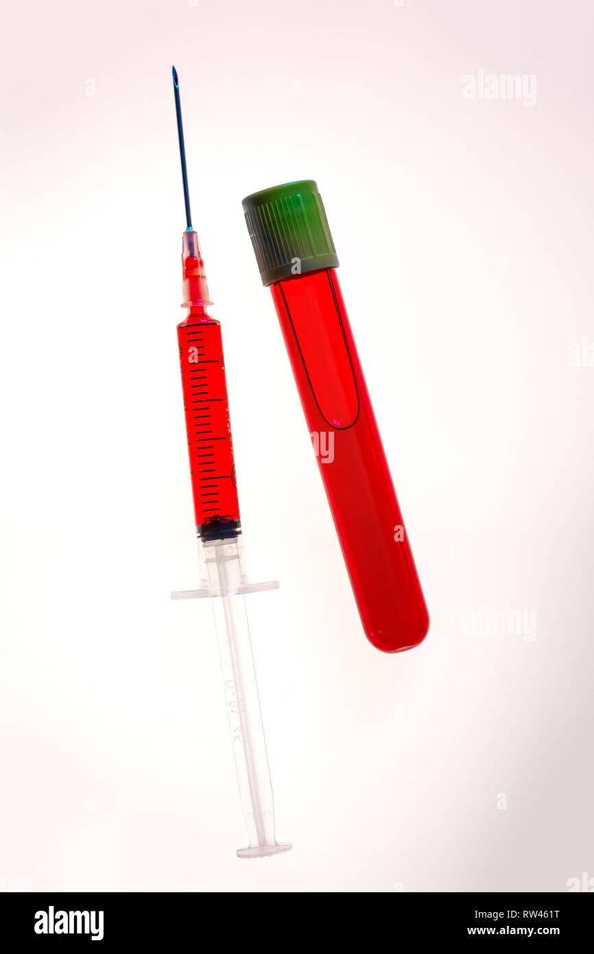 Syringe and test tube with blood isolated on white background Stock ...