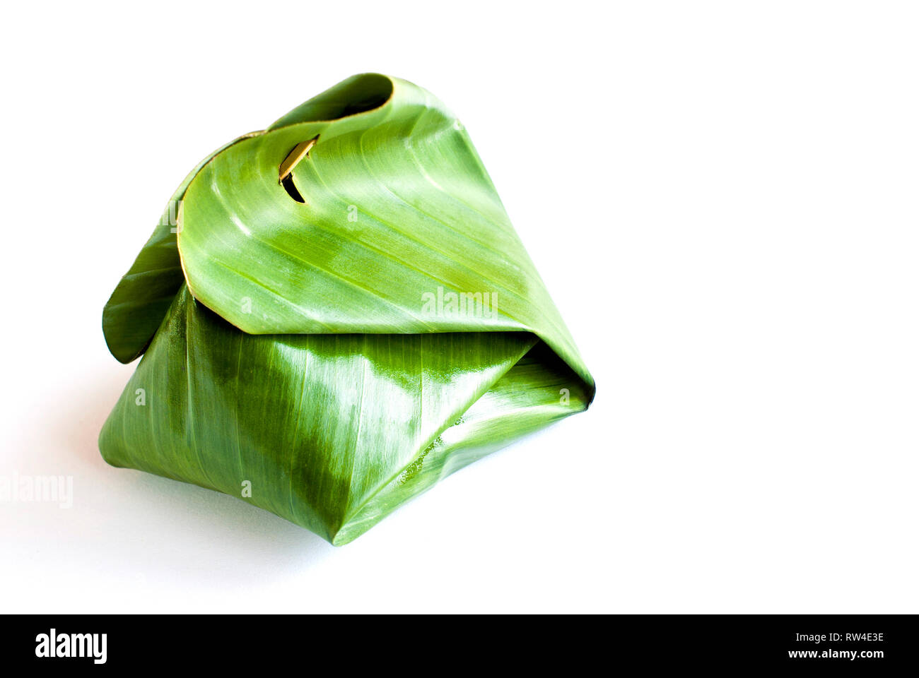 Sweet sticky rice with Thai custard in the banana leaf wrapped Stock ...