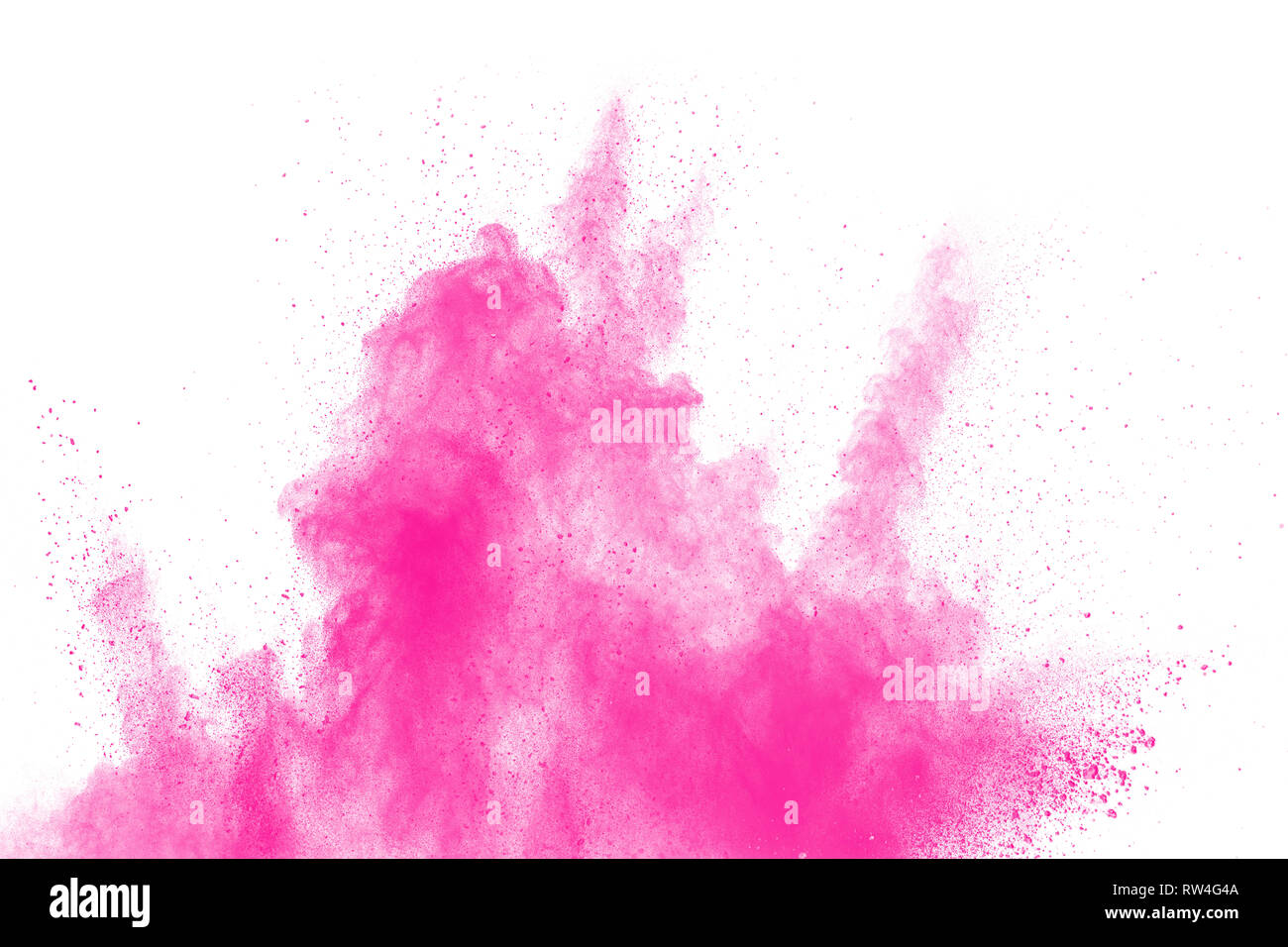 Abstract pink dust explosion on white background. Freeze motion of pink ...