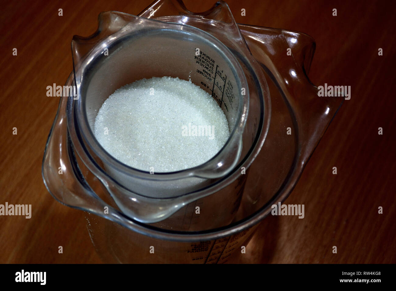 Measuring cup sugar hi-res stock photography and images - Alamy