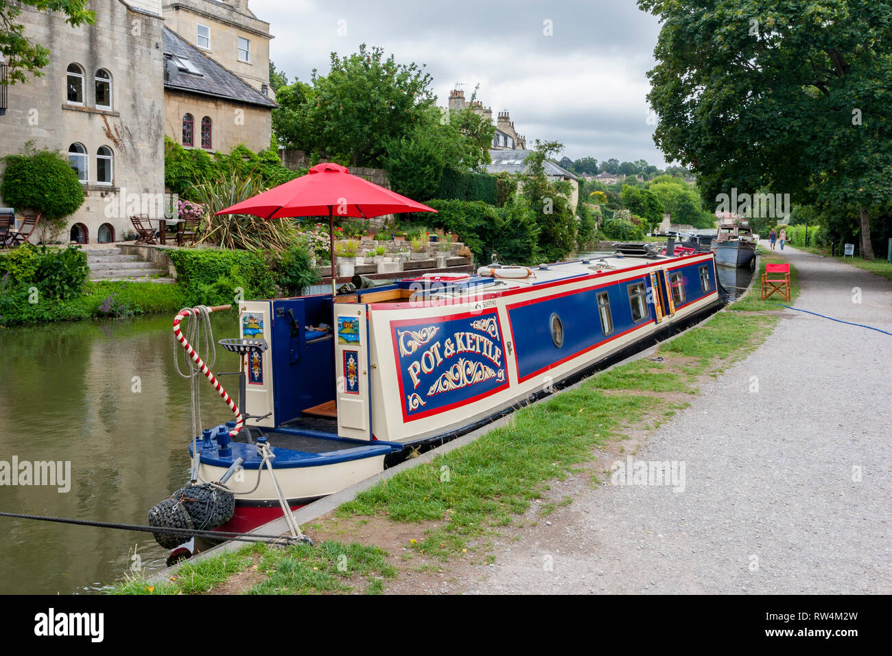 A colourful restored long boat barge moored on the Kennet & Avon Canal ...