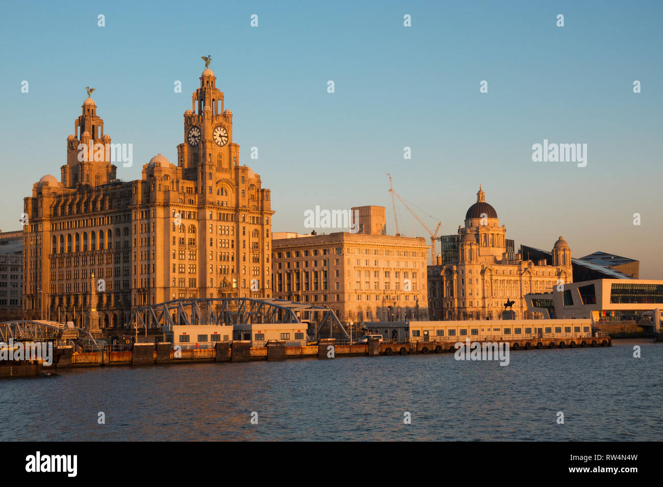 Liverpool's world famous waterfront buildings lit up by the late ...