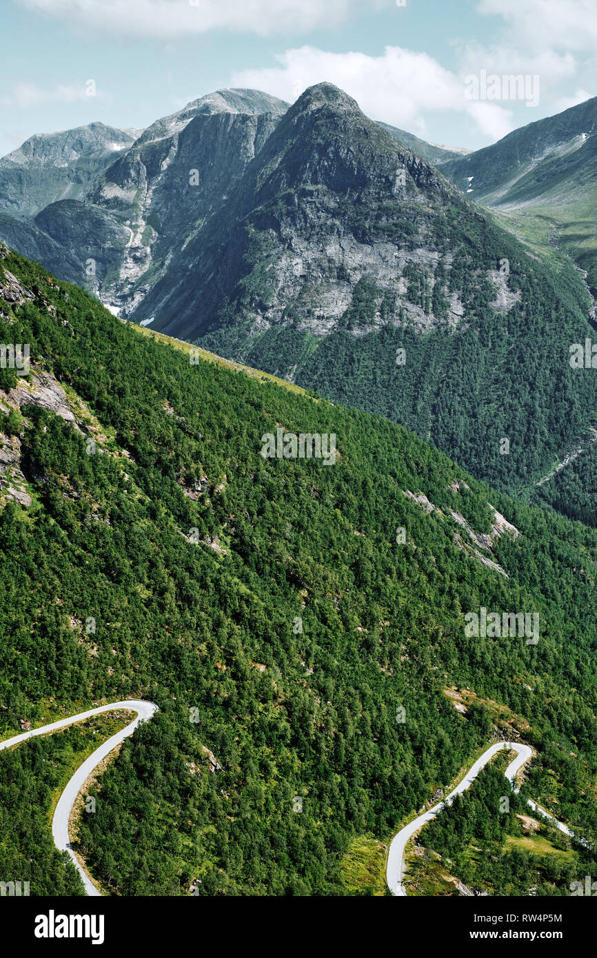 Two hairpin bends on the twisting switchback road climbing up ...